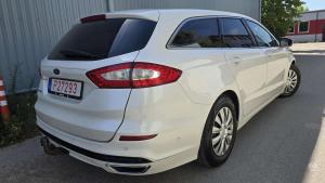 White Ford Mondeo 2015 in Kaunas, with an engine capacity of 2.00 L and mileage of 300 thousand km for 4499 €, photo 4 on AUTOMOTO.COM.LV