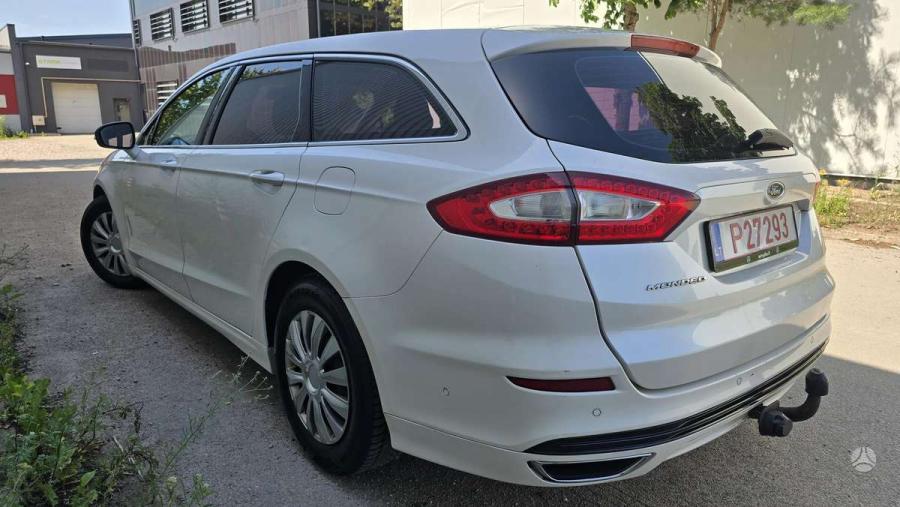 White Ford Mondeo 2015 in Kaunas, with an engine capacity of 2.00 L and mileage of 300 thousand km for 4499 €, photo 6 on AUTOMOTO.COM.LV