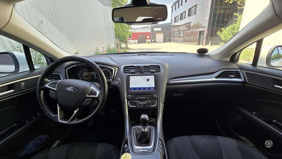 White Ford Mondeo 2015 in Kaunas, with an engine capacity of 2.00 L and mileage of 300 thousand km for 4499 €, photo 10 on AUTOMOTO.COM.LV