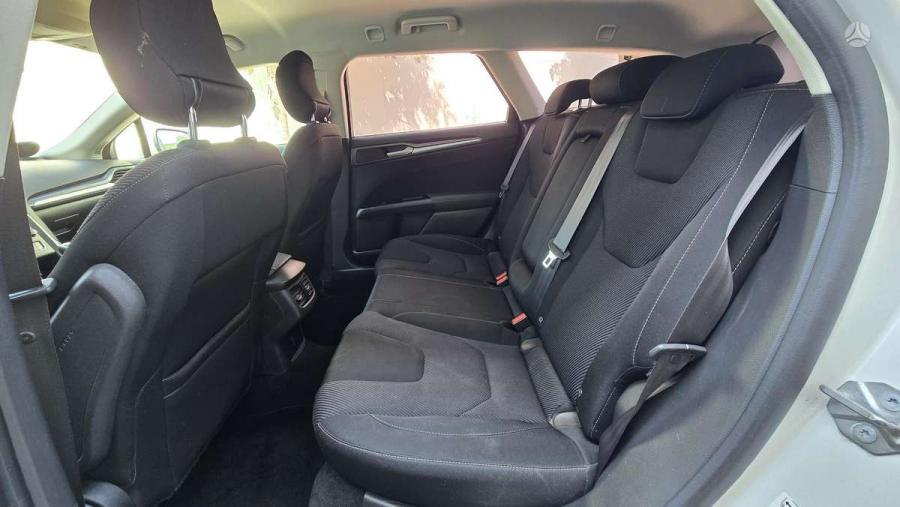 White Ford Mondeo 2015 in Kaunas, with an engine capacity of 2.00 L and mileage of 300 thousand km for 4499 €, photo 13 on AUTOMOTO.COM.LV
