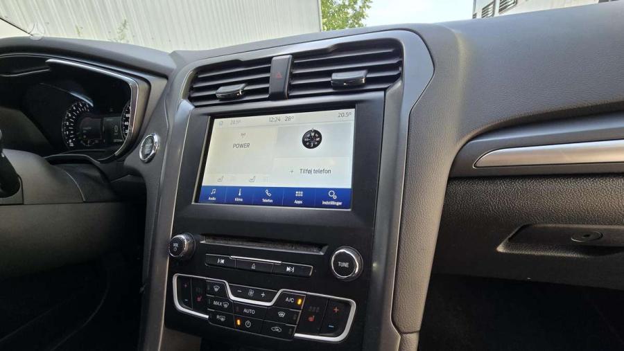 White Ford Mondeo 2015 in Kaunas, with an engine capacity of 2.00 L and mileage of 300 thousand km for 4499 €, photo 15 on AUTOMOTO.COM.LV