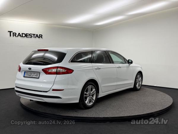 White Ford Mondeo 2015 in Parnu, with an engine capacity of 2.00 L and mileage of 206 thousand km for 7490 €, photo 5 on AUTOMOTO.COM.LV