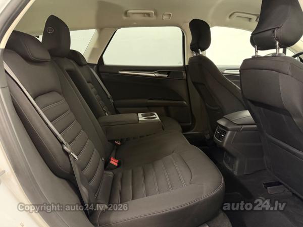 White Ford Mondeo 2015 in Parnu, with an engine capacity of 2.00 L and mileage of 206 thousand km for 7490 €, photo 10 on AUTOMOTO.COM.LV