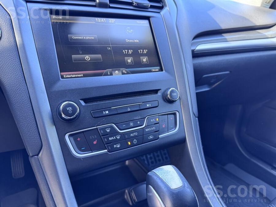 White Ford Mondeo 2015 in Jurmala, with an engine capacity of 2.00 L and mileage of 0 thousand km for 5300 €, photo 18 on AUTOMOTO.COM.LV