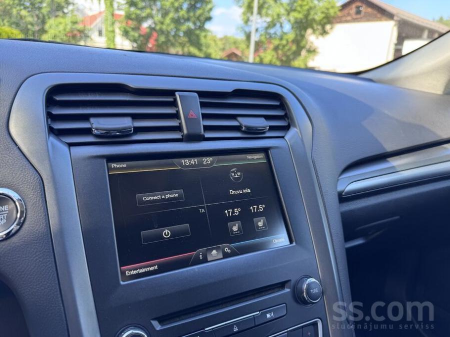 White Ford Mondeo 2015 in Jurmala, with an engine capacity of 2.00 L and mileage of 0 thousand km for 5300 €, photo 19 on AUTOMOTO.COM.LV