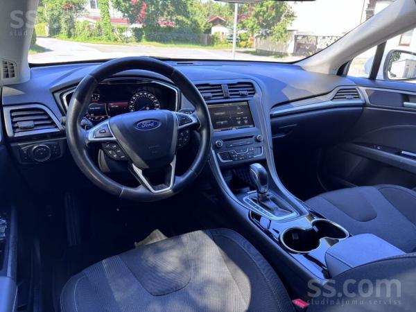 White Ford Mondeo 2015 in Jurmala, with an engine capacity of 2.00 L and mileage of 0 thousand km for 5300 €, photo 9 on AUTOMOTO.COM.LV
