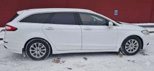 White Ford Mondeo 2016 in Kaunas, with an engine capacity of 1.56 L and mileage of 229 thousand km for 5450 €, photo 7 on AUTOMOTO.COM.LV