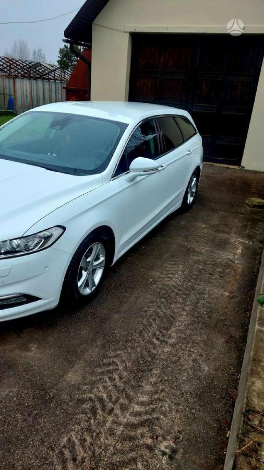 White Ford Mondeo 2016 in Vilnius, with an engine capacity of 2.00 L and mileage of 350 thousand km for 6200 €, photo 3 on AUTOMOTO.COM.LV