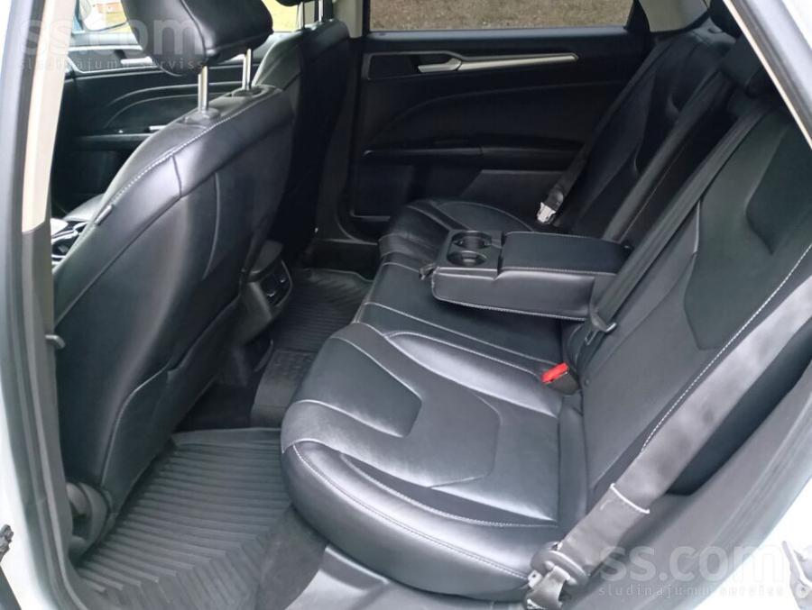 White Ford Mondeo 2016 in Riga, with an engine capacity of 2.00 L and mileage of 270 thousand km for 6750 €, photo 6 on AUTOMOTO.COM.LV