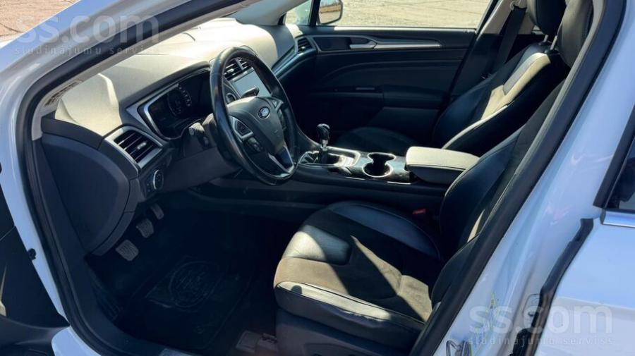 White Ford Mondeo 2016 in Riga, with an engine capacity of 2.00 L and mileage of 0 thousand km for 7999 €, photo 10 on AUTOMOTO.COM.LV