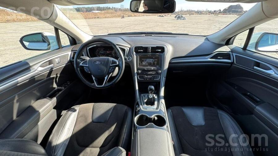 White Ford Mondeo 2016 in Riga, with an engine capacity of 2.00 L and mileage of 0 thousand km for 7999 €, photo 12 on AUTOMOTO.COM.LV