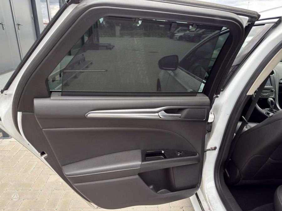 White Ford Mondeo 2016 in Taurage, with an engine capacity of 2.00 L and mileage of 283 thousand km for 7500 €, photo 28 on AUTOMOTO.COM.LV