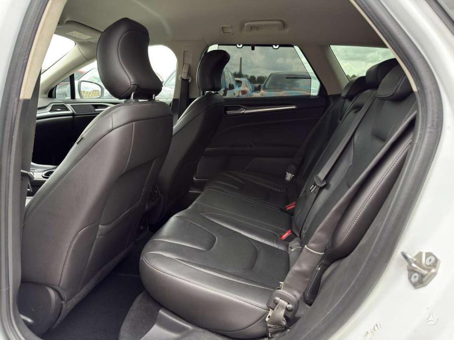 White Ford Mondeo 2016 in Taurage, with an engine capacity of 2.00 L and mileage of 283 thousand km for 7500 €, photo 29 on AUTOMOTO.COM.LV