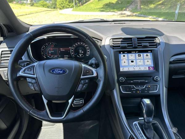 White Ford Mondeo 2017 in Kaunas, with an engine capacity of 2.00 L and mileage of 263 thousand km for 9950 €, photo 3 on AUTOMOTO.COM.LV