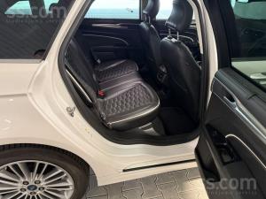 White Ford Mondeo 2017 in Riga, with an engine capacity of 2.00 L and mileage of 322 thousand km for 8999 €, photo 12 on AUTOMOTO.COM.LV