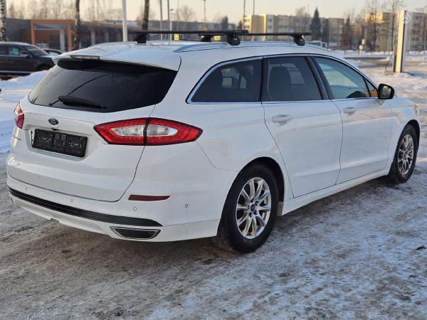 White Ford Mondeo 2018 in Rokiskis, with an engine capacity of 2.00 L and mileage of 238 thousand km for 6050 €, photo 3 on AUTOMOTO.COM.LV