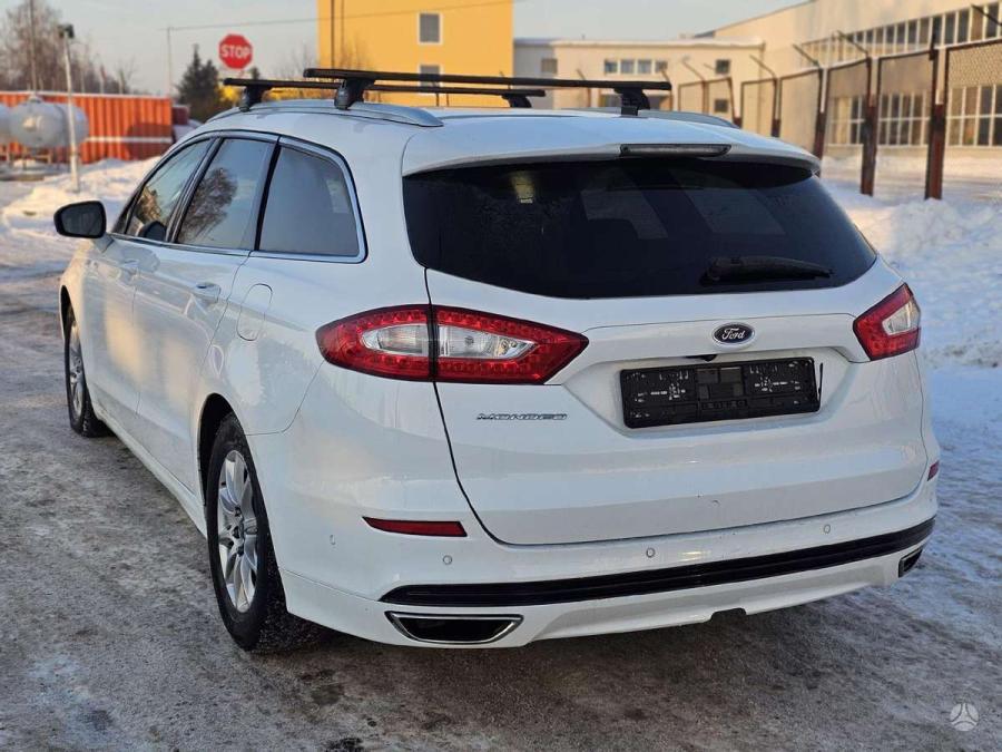 White Ford Mondeo 2018 in Rokiskis, with an engine capacity of 2.00 L and mileage of 238 thousand km for 6050 €, photo 7 on AUTOMOTO.COM.LV