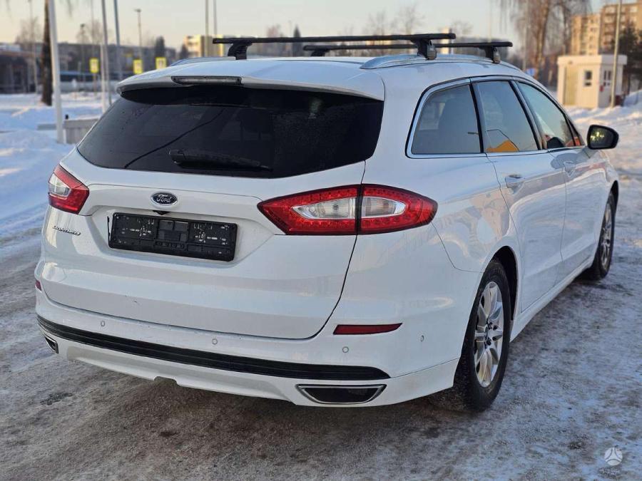 White Ford Mondeo 2018 in Rokiskis, with an engine capacity of 2.00 L and mileage of 238 thousand km for 6050 €, photo 8 on AUTOMOTO.COM.LV