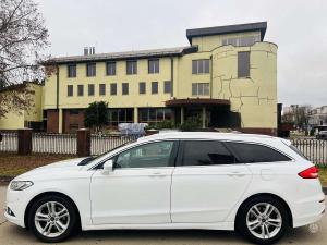 White Ford Mondeo 2019 in Kaunas, with an engine capacity of 2.00 L and mileage of 235 thousand km for 8450 €, photo 3 on AUTOMOTO.COM.LV