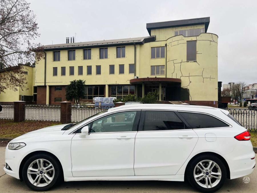 White Ford Mondeo 2019 in Kaunas, with an engine capacity of 2.00 L and mileage of 235 thousand km for 8450 €, photo 3 on AUTOMOTO.COM.LV