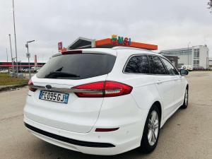 White Ford Mondeo 2019 in Kaunas, with an engine capacity of 2.00 L and mileage of 235 thousand km for 8450 €, photo 5 on AUTOMOTO.COM.LV