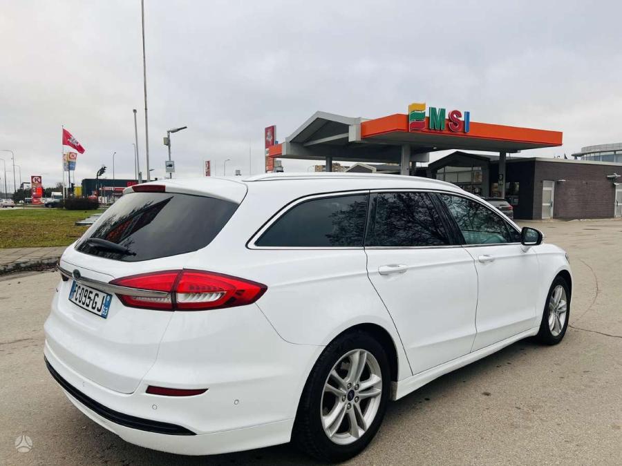 White Ford Mondeo 2019 in Kaunas, with an engine capacity of 2.00 L and mileage of 235 thousand km for 8450 €, photo 8 on AUTOMOTO.COM.LV