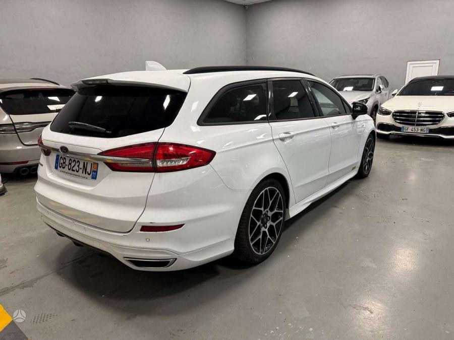 White Ford Mondeo 2021 in Taurage, with an engine capacity of 2.00 L and mileage of 270 thousand km for 8300 €, photo 2 on AUTOMOTO.COM.LV