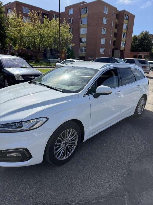 White Ford Mondeo 2021 in Siauliai, with an engine capacity of 0.00 L and mileage of 170 thousand km for 12700 €, photo 5 on AUTOMOTO.COM.LV