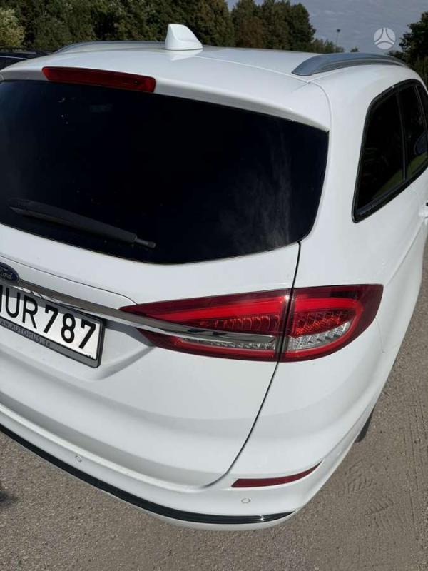 White Ford Mondeo 2021 in Siauliai, with an engine capacity of 0.00 L and mileage of 170 thousand km for 12700 €, photo 8 on AUTOMOTO.COM.LV