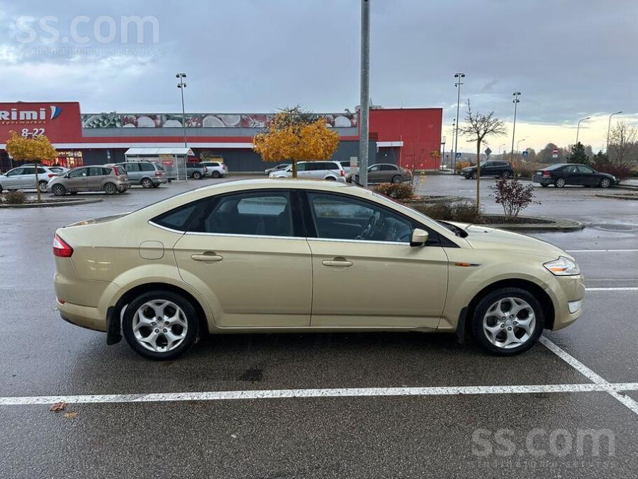 Yellow Ford Mondeo 2007 in Riga, with an engine capacity of 2.00 L and mileage of 240 thousand km for 1890 €, photo 1 on AUTOMOTO.COM.LV