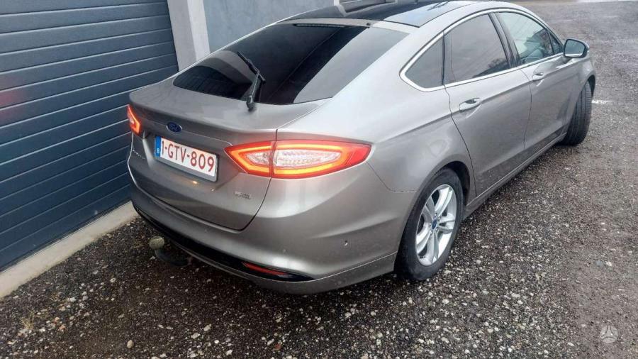 Yellow Ford Mondeo 2018 in Klaipeda, with an engine capacity of 1.50 L and mileage of 119 thousand km for 11950 €, photo 4 on AUTOMOTO.COM.LV