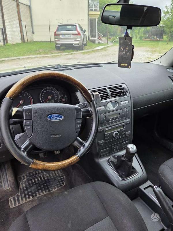 Yellow Ford Mondeo 2006 in Palanga, with an engine capacity of 1.80 L and mileage of 289 thousand km for 350 €, photo 9 on AUTOMOTO.COM.LV