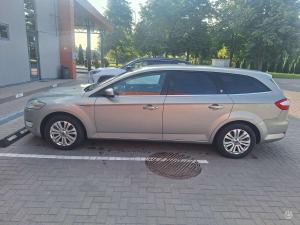 Yellow Ford Mondeo 2010 in Marijampole, with an engine capacity of 1.75 L and mileage of 248 thousand km for 2750 €, photo 12 on AUTOMOTO.COM.LV