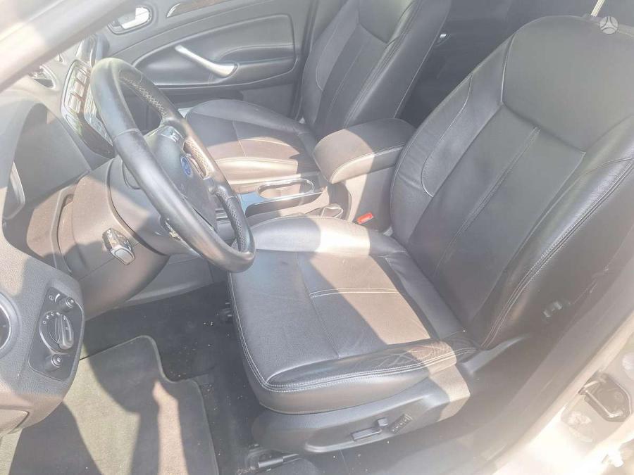 Yellow Ford Mondeo 2010 in Marijampole, with an engine capacity of 1.75 L and mileage of 248 thousand km for 2750 €, photo 25 on AUTOMOTO.COM.LV