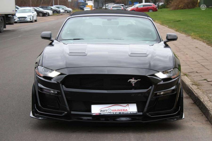 Black Ford Mustang 2019 in Vilnius, with an engine capacity of 5.00 L and mileage of 130 thousand km for 29990 €, photo 6 on AUTOMOTO.COM.LV