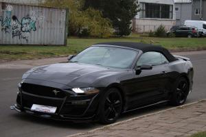 Black Ford Mustang 2019 in Vilnius, with an engine capacity of 5.00 L and mileage of 130 thousand km for 29990 €, photo 7 on AUTOMOTO.COM.LV