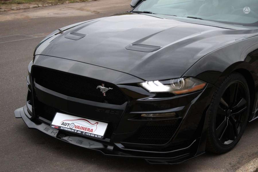Black Ford Mustang 2019 in Vilnius, with an engine capacity of 5.00 L and mileage of 130 thousand km for 29990 €, photo 12 on AUTOMOTO.COM.LV