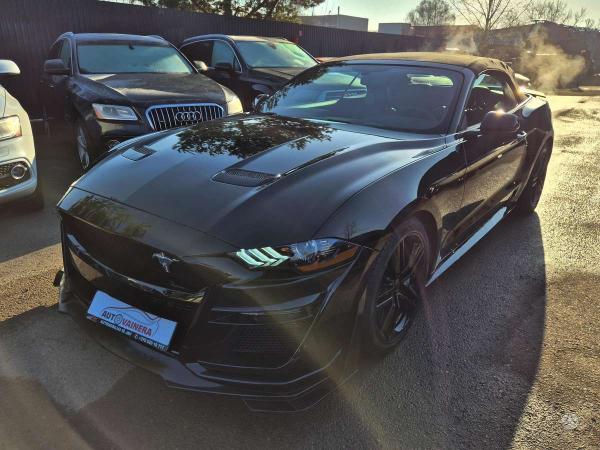 Black Ford Mustang 2019 in Vilnius, with an engine capacity of 5.00 L and mileage of 130 thousand km for 28999 €, photo 5 on AUTOMOTO.COM.LV