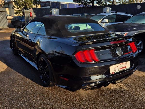 Black Ford Mustang 2019 in Vilnius, with an engine capacity of 5.00 L and mileage of 130 thousand km for 28999 €, photo 6 on AUTOMOTO.COM.LV