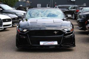Black Ford Mustang 2019 in Vilnius, with an engine capacity of 5.00 L and mileage of 130 thousand km for 28999 €, photo 3 on AUTOMOTO.COM.LV