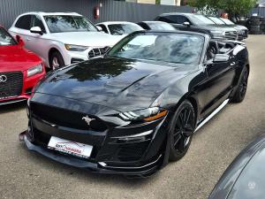 Black Ford Mustang 2019 in Vilnius, with an engine capacity of 5.00 L and mileage of 130 thousand km for 28999 €, photo 4 on AUTOMOTO.COM.LV