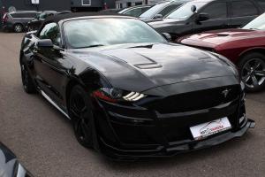 Black Ford Mustang 2019 in Vilnius, with an engine capacity of 5.00 L and mileage of 130 thousand km for 28999 €, photo 8 on AUTOMOTO.COM.LV