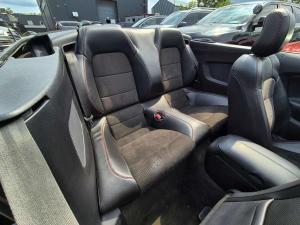 Black Ford Mustang 2019 in Vilnius, with an engine capacity of 5.00 L and mileage of 130 thousand km for 28999 €, photo 14 on AUTOMOTO.COM.LV