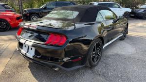 Black Ford Mustang 2023 in Ukmerge, with an engine capacity of 2.25 L and mileage of 58 thousand km for 28499 €, photo 7 on AUTOMOTO.COM.LV