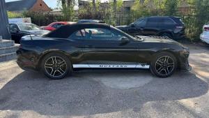 Black Ford Mustang 2023 in Ukmerge, with an engine capacity of 2.25 L and mileage of 58 thousand km for 28499 €, photo 8 on AUTOMOTO.COM.LV