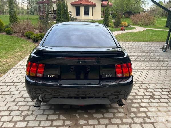 Melns Ford Mustang 2000 Ogre, ar dzinēja tilpumu 4.60 L un nobraukumu 191 tūkst. km par 7900 €, foto 4 vietnē AUTOMOTO.COM.LV