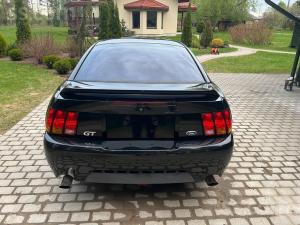 Melns Ford Mustang 2000 Ogre, ar dzinēja tilpumu 4.60 L un nobraukumu 191 tūkst. km par 7900 €, foto 5 vietnē AUTOMOTO.COM.LV