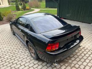 Melns Ford Mustang 2000 Ogre, ar dzinēja tilpumu 4.60 L un nobraukumu 191 tūkst. km par 7900 €, foto 6 vietnē AUTOMOTO.COM.LV
