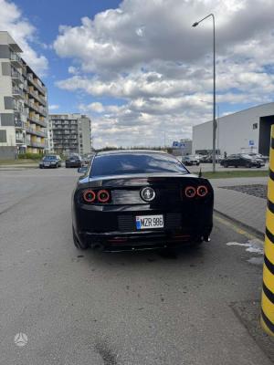 Black Ford Mustang 2014 in Vilnius, with an engine capacity of 3.73 L and mileage of 207 thousand km for 14999 €, photo 15 on AUTOMOTO.COM.LV