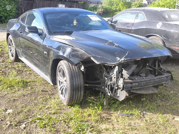 Black Ford Mustang 2017 in Ukmerge, with an engine capacity of 2.30 L and mileage of 60 thousand km for 7500 €, photo 1 on AUTOMOTO.COM.LV